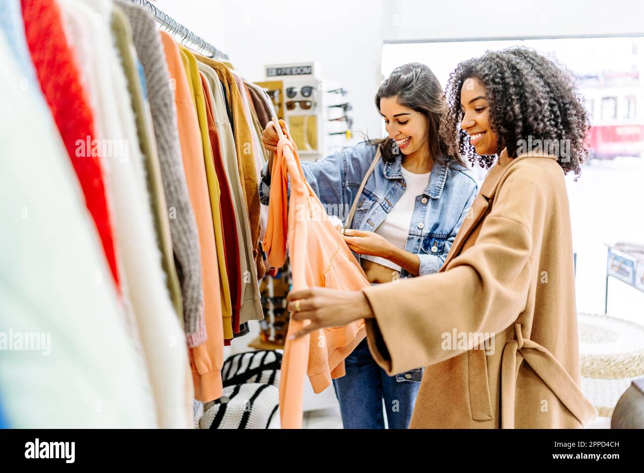 Happy people shopping together hi-res stock photography and images - Alamy