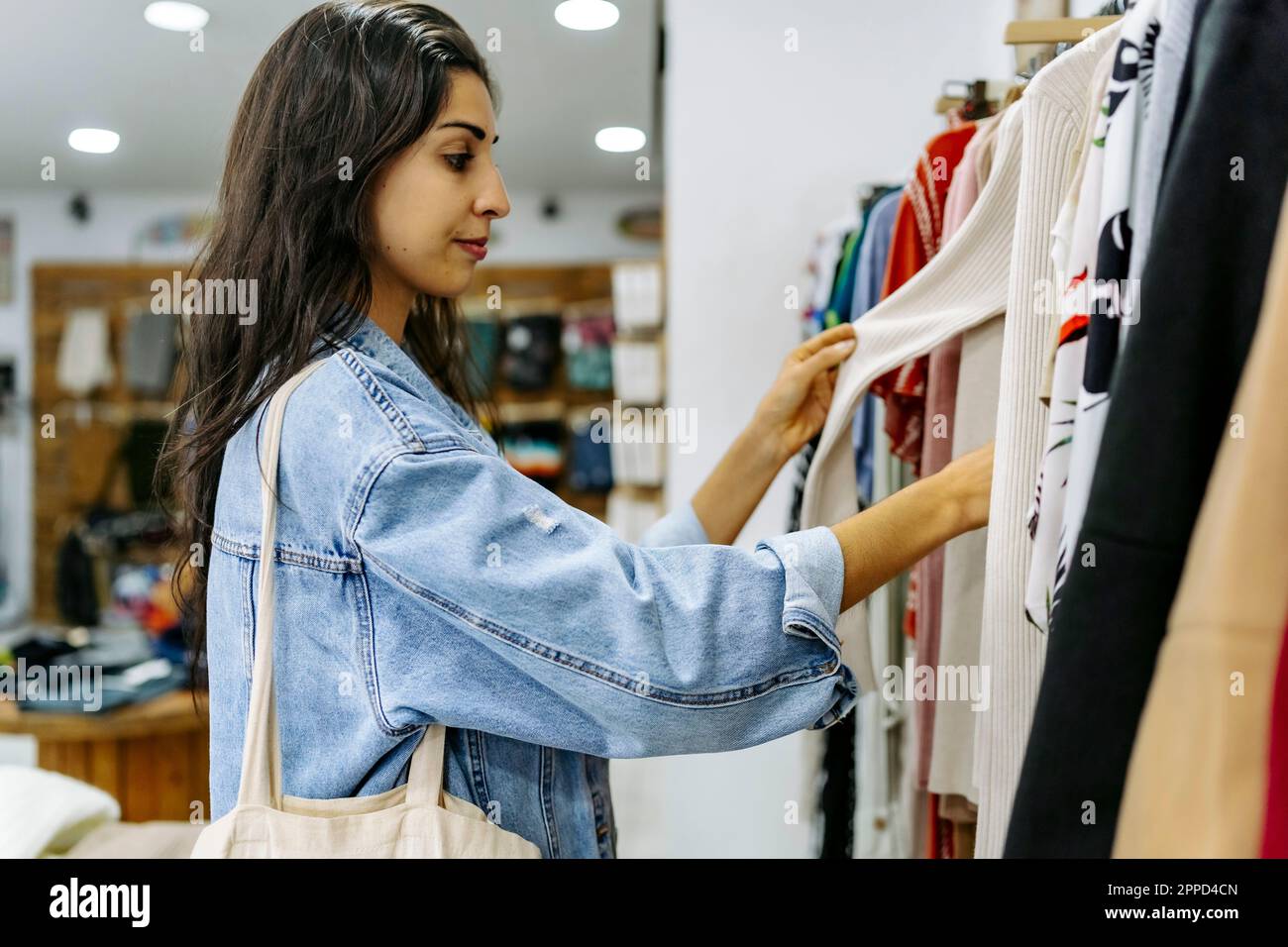 Choosing clothes shop hi-res stock photography and images - Alamy