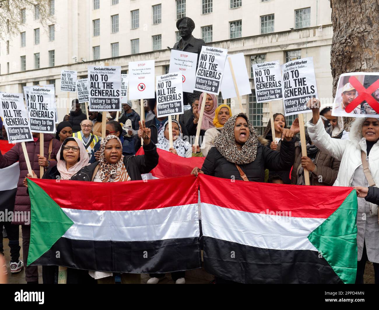 A group of Sudanese people protesting in Whitehall London on 23 April ...