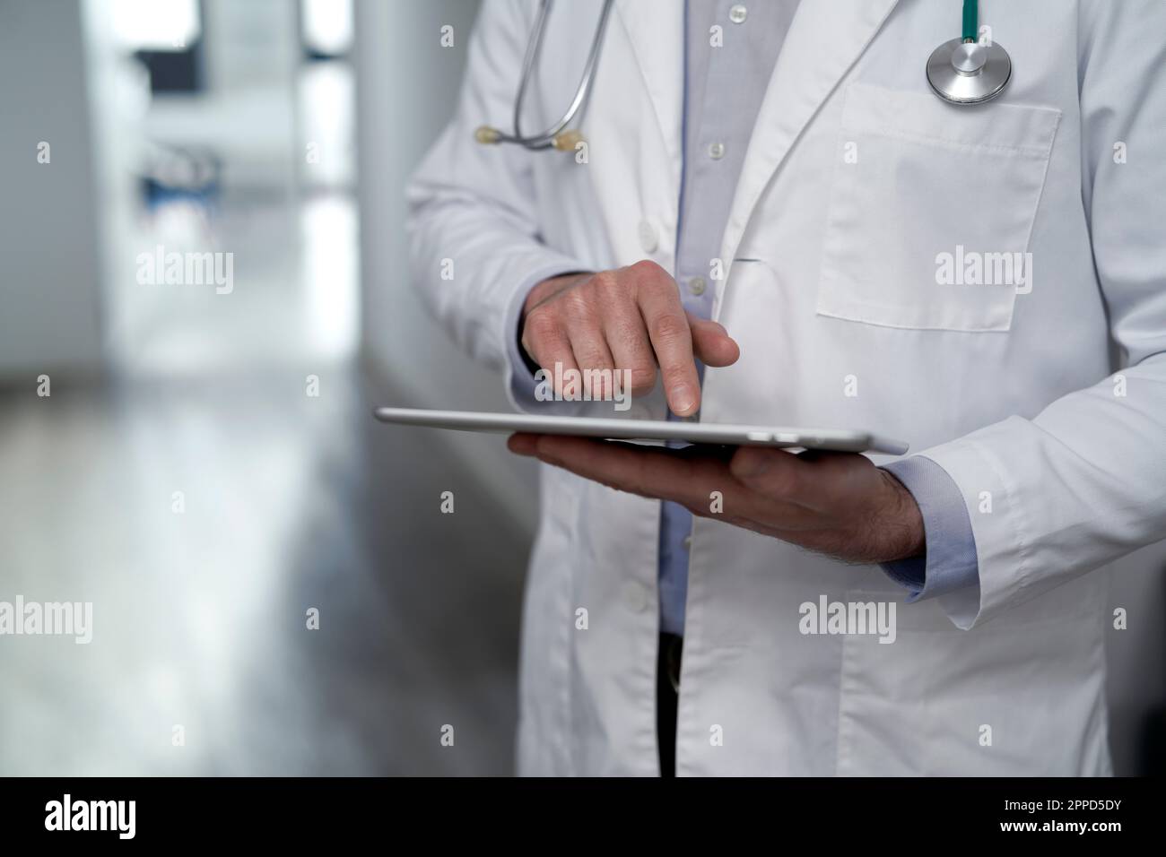 Doctor tablet stethoscope in clinic hi-res stock photography and images ...