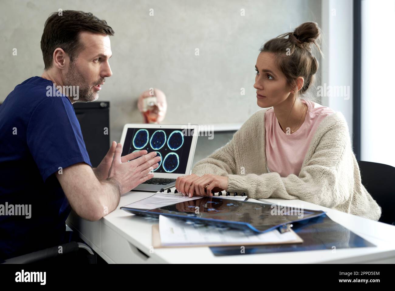 Female medical doctor explaining scan hi-res stock photography and ...