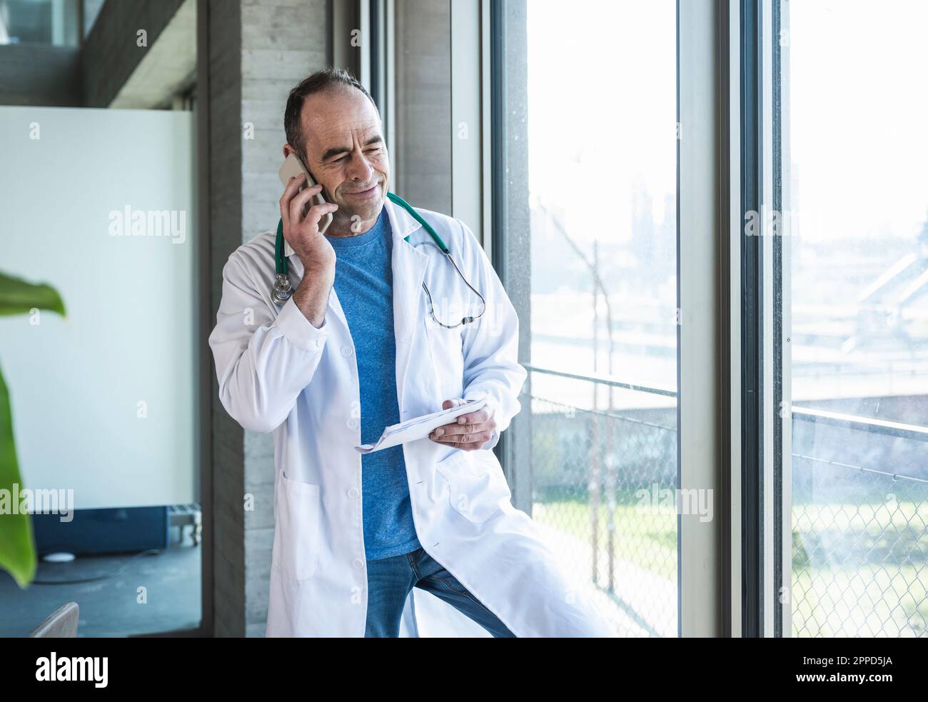 Standing smiling communication uniform hi-res stock photography and ...