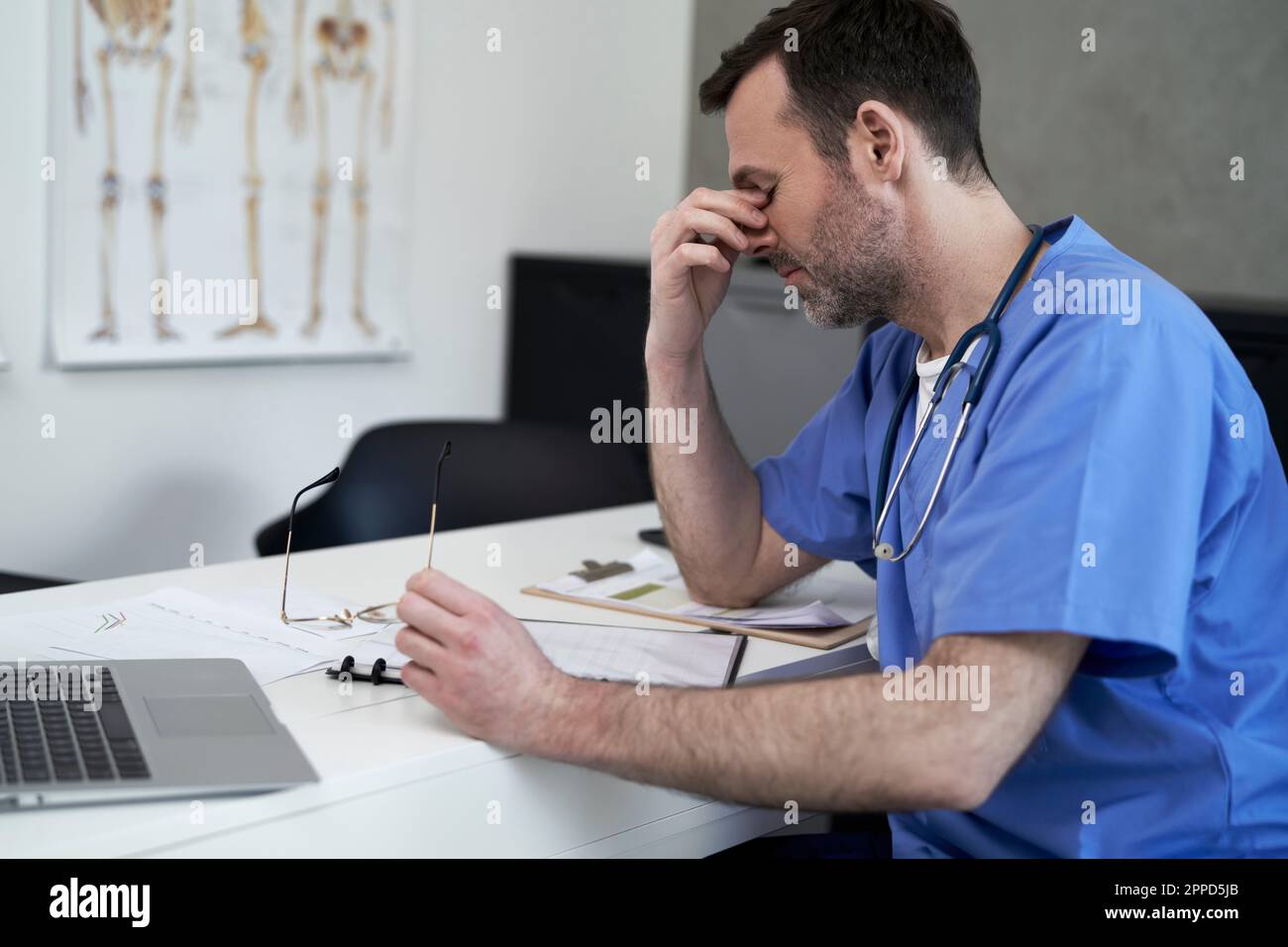 Tired doctor hi-res stock photography and images - Alamy
