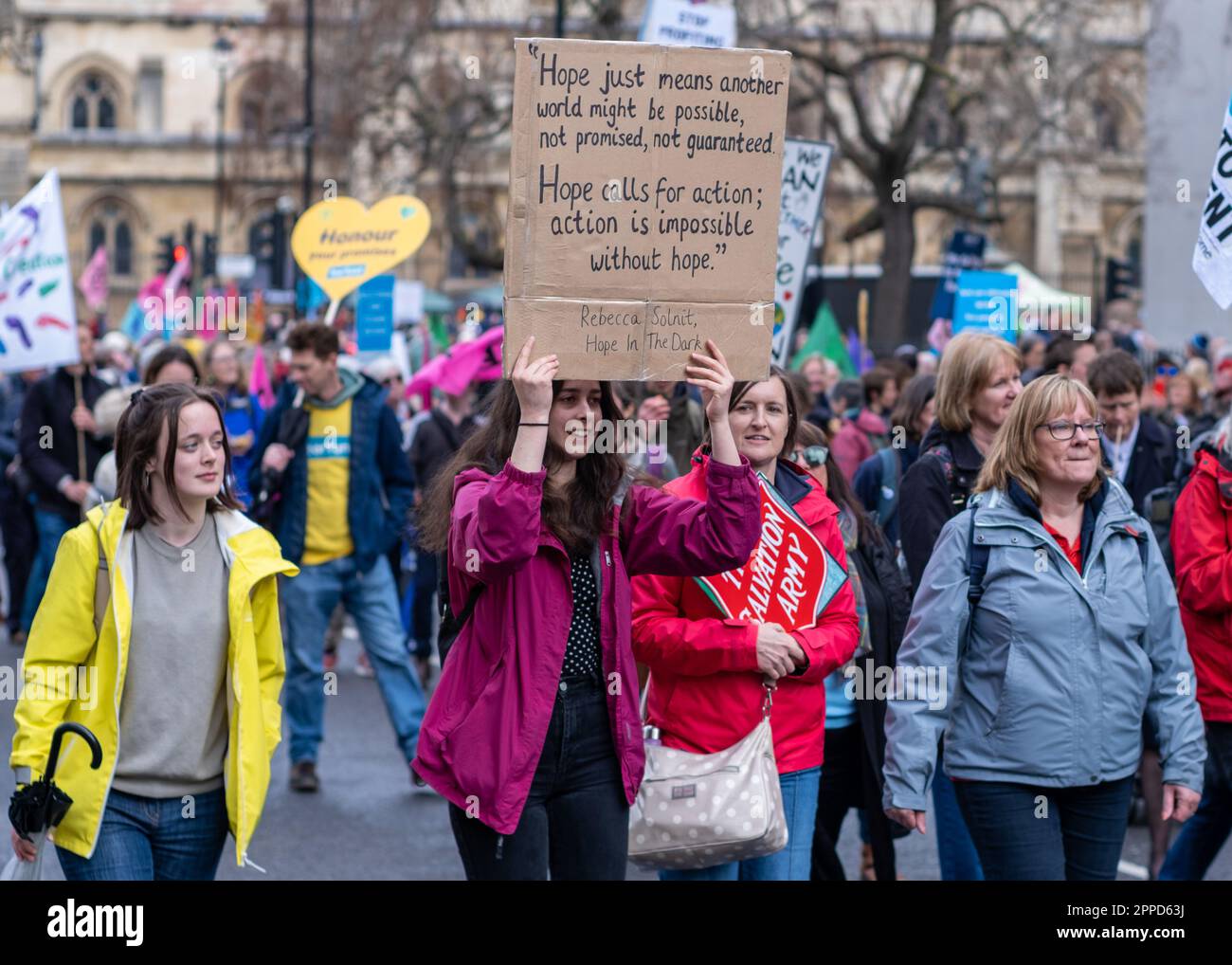 Protester holding a protest banner during a demonstration at Parliament ...