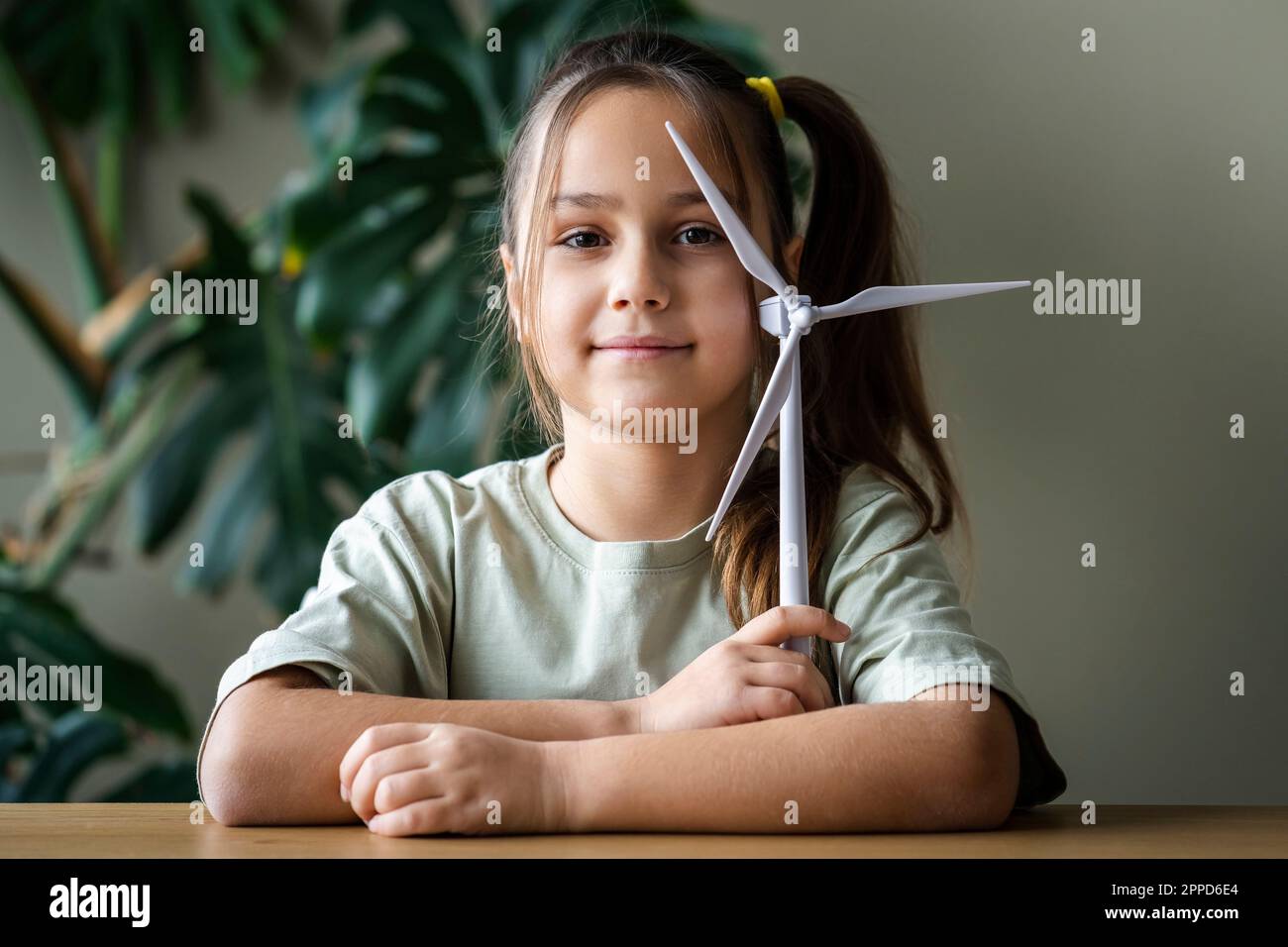 Girl wind turbine hi-res stock photography and images - Alamy