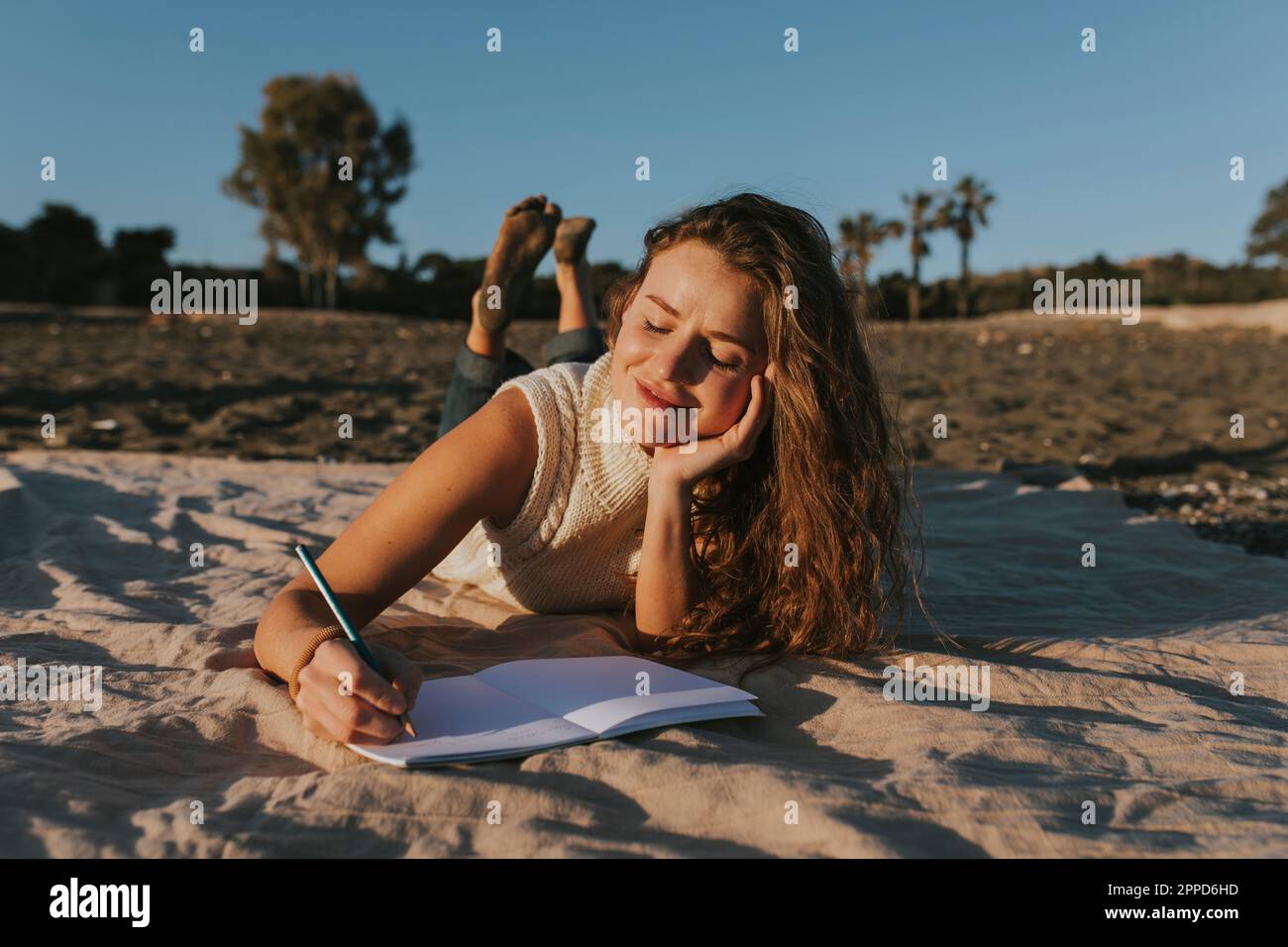 Woman pen beach hi-res stock photography and images - Alamy