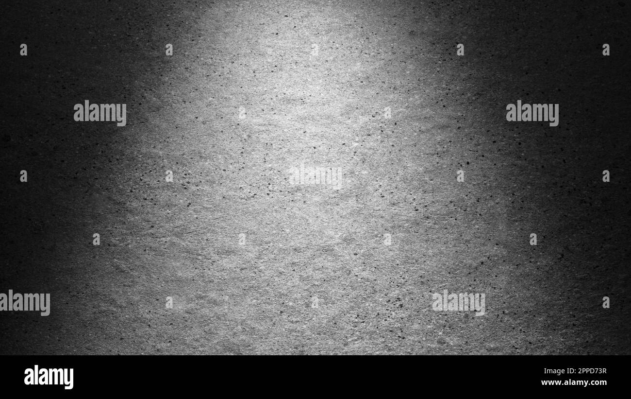 Dark room in beam of light with concrete wall and floor. Texture ...