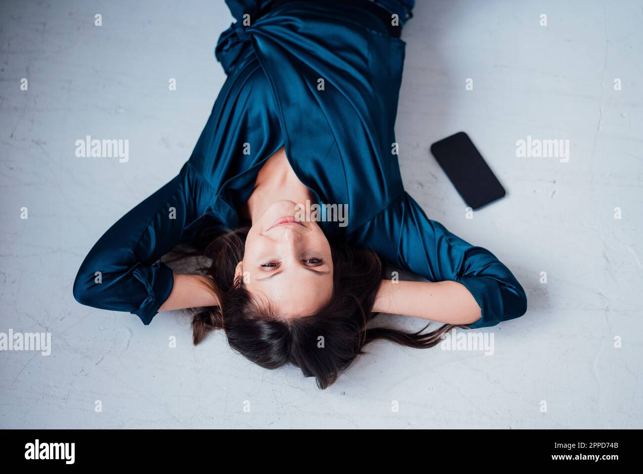Female lying down hands on hi-res stock photography and images - Alamy