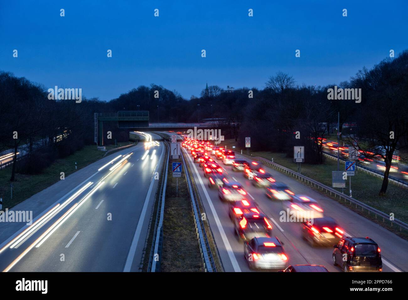 Germany, Bavaria, Long exposure of traffic jam on multiple lane highway ...