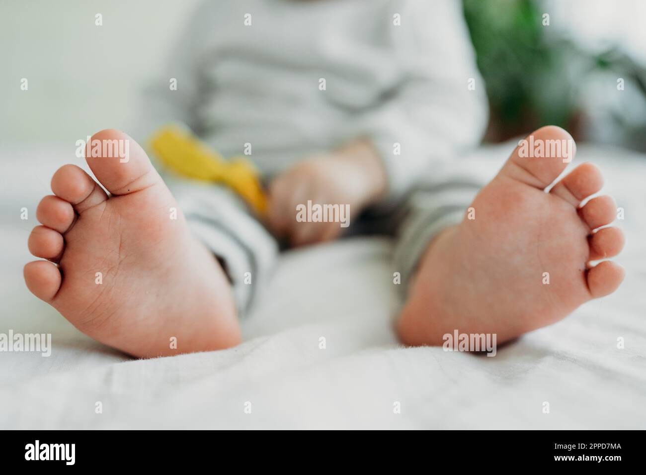 Toddler feet hi-res stock photography and images - Alamy