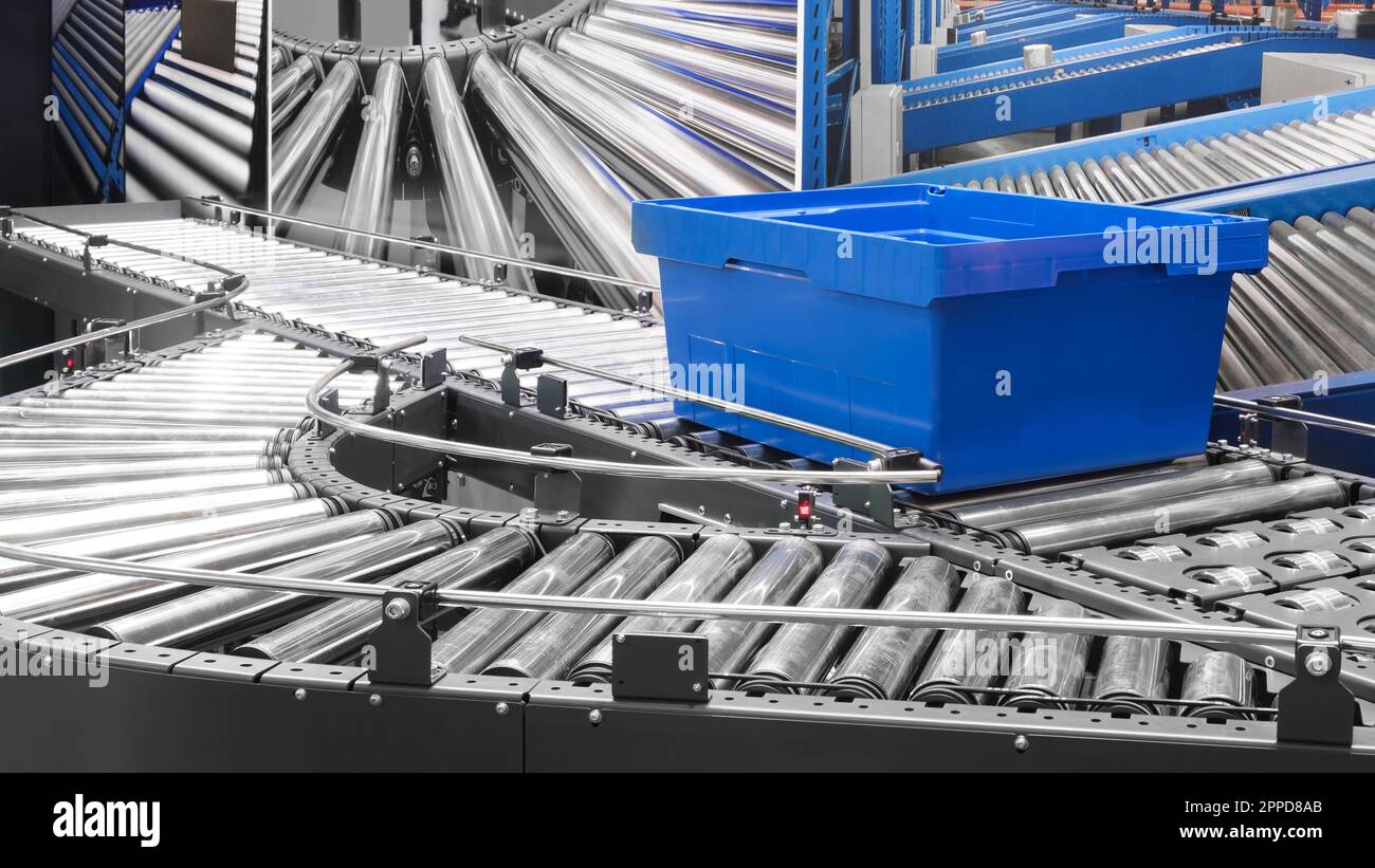 Crossing of the roller conveyor with plastic boxes, Production line ...