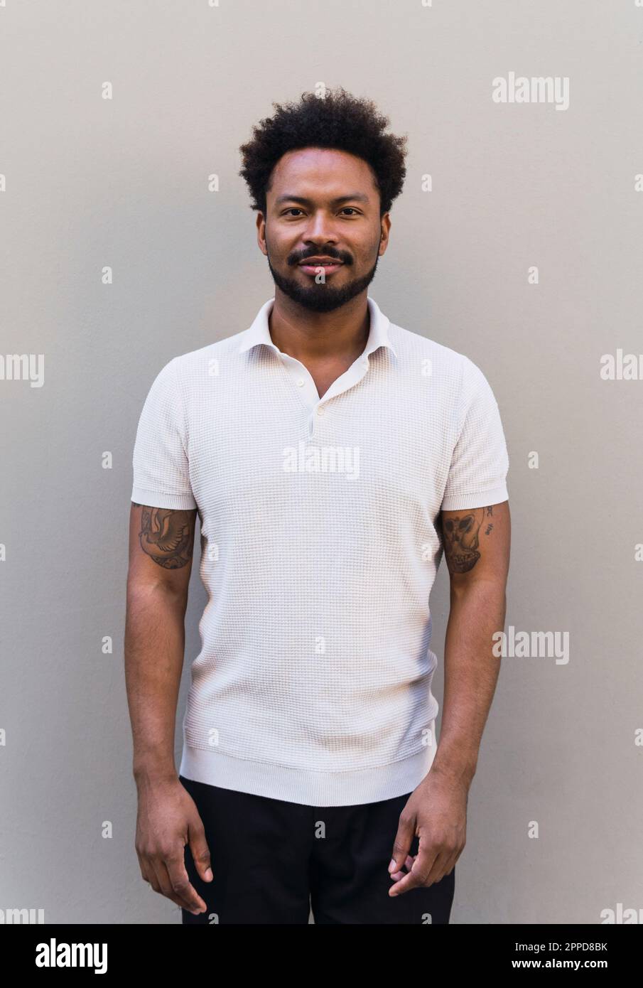 Standing man wearing polo hi-res stock photography and images - Alamy