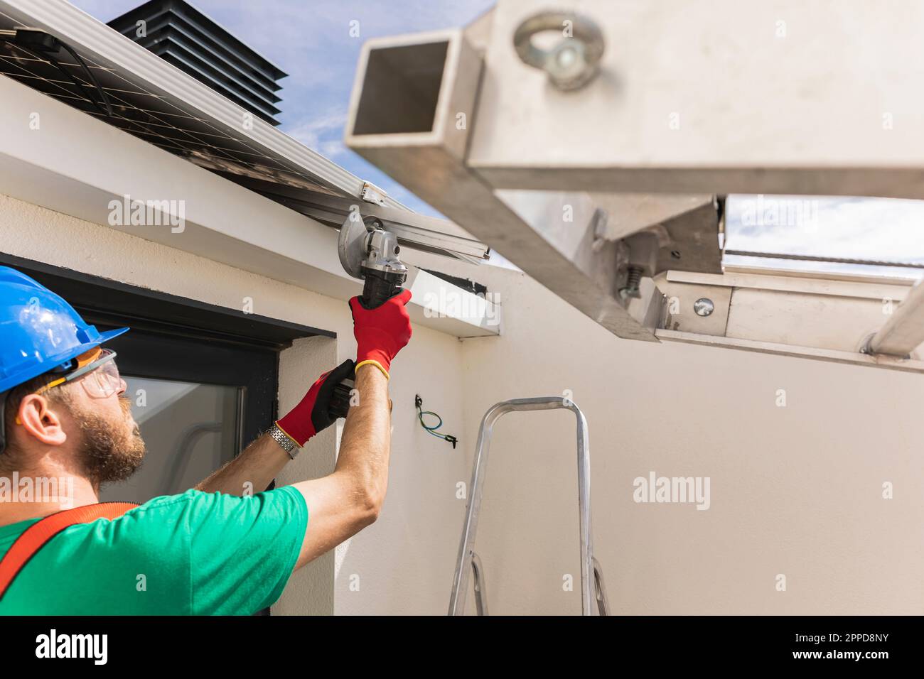 Engineer cutting metal with hand saw Stock Photo - Alamy