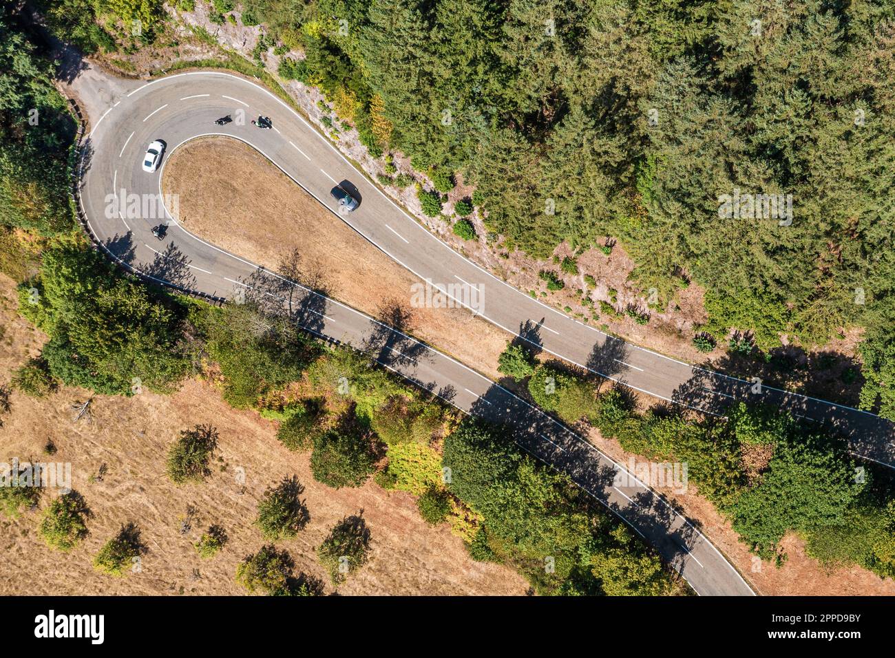 Germany, Baden-Wurttemberg, Aerial view of hairpin curve of asphalt ...