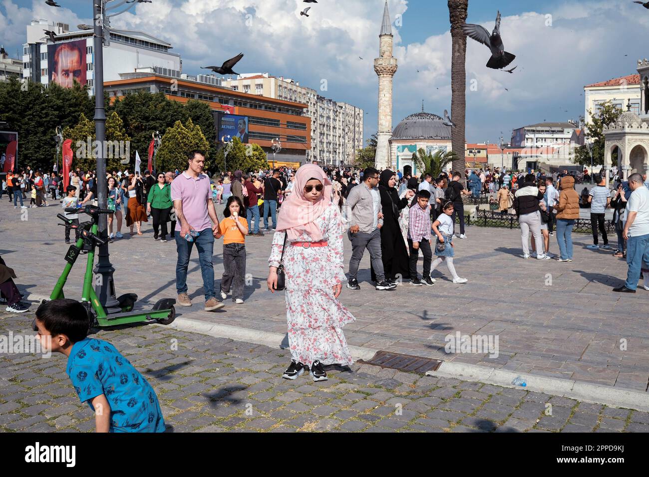 People seen walking around Konak Square. With the Eid al-Fitr Holiday ...