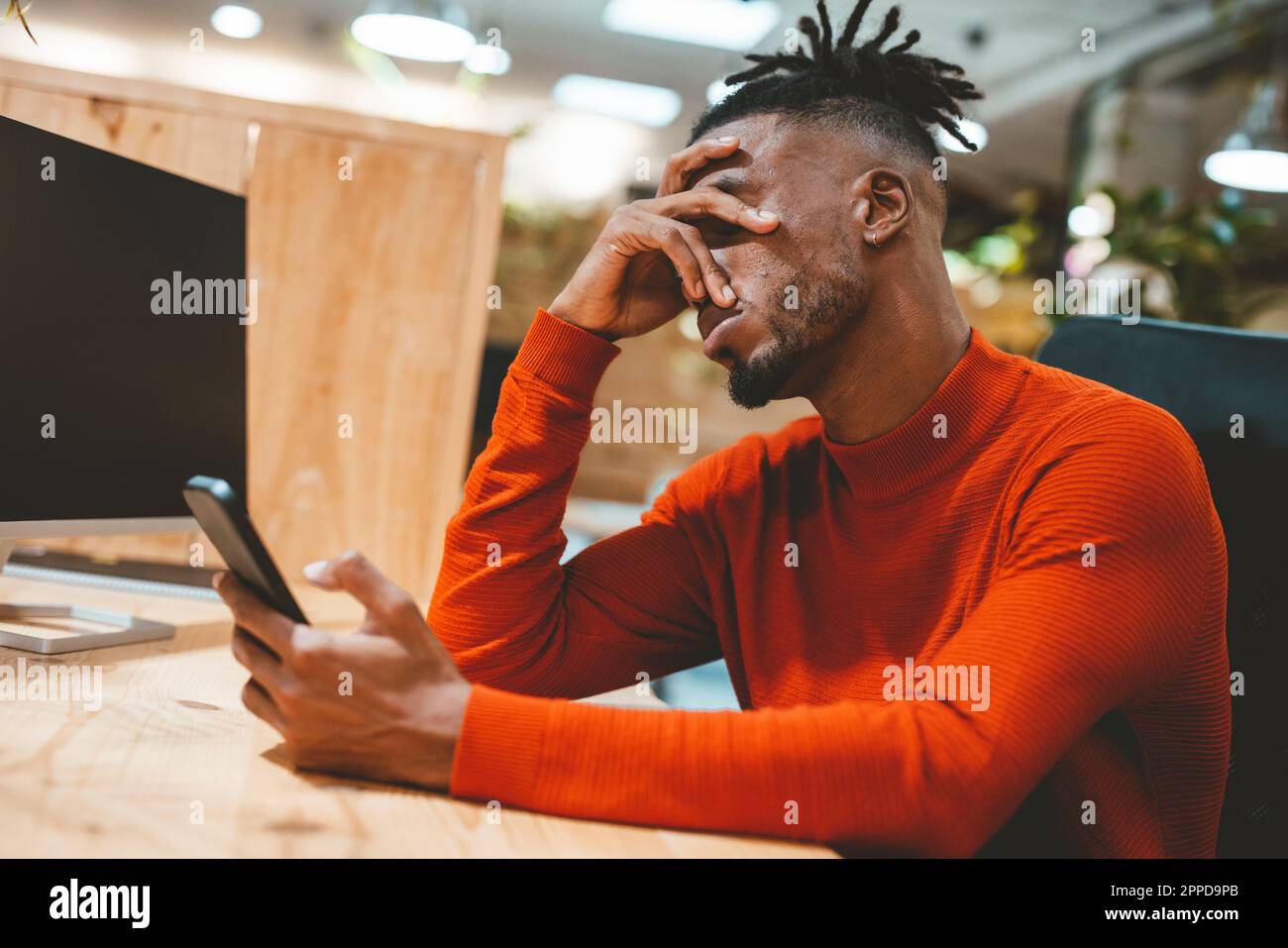 Stressed person on the phone hi-res stock photography and images - Alamy
