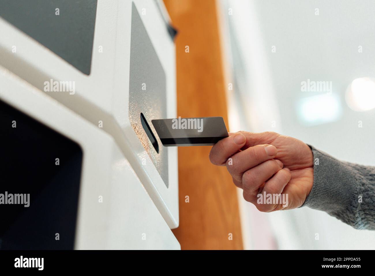 Male hand inserting credit hi-res stock photography and images - Alamy