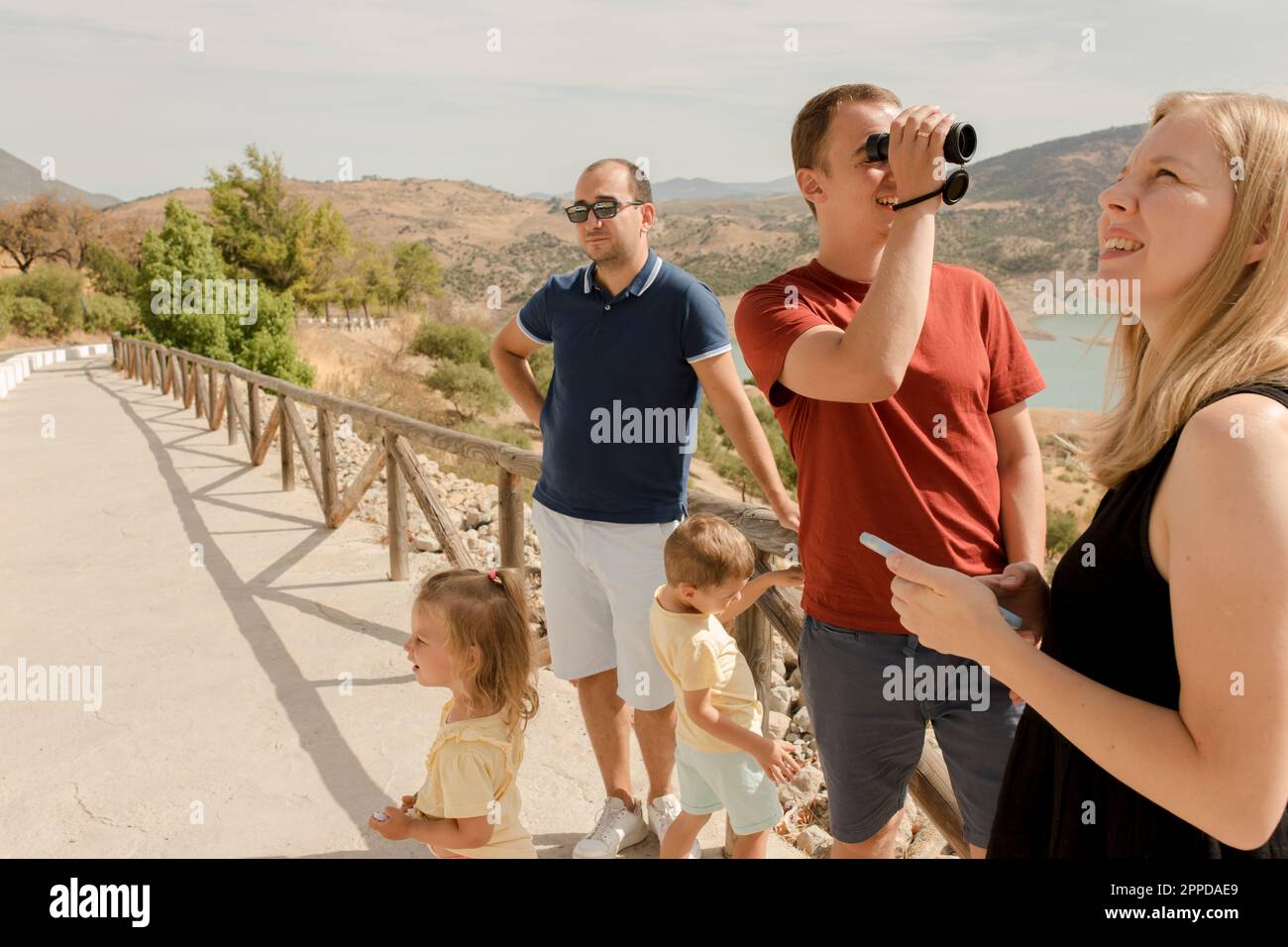 Happy family enjoying vacation together Stock Photo - Alamy
