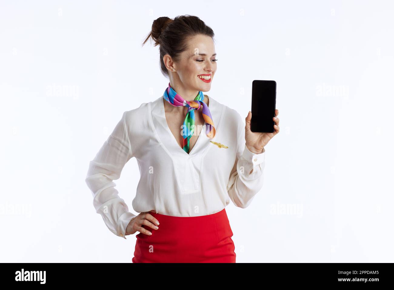 happy stylish female air hostess isolated on white background in ...