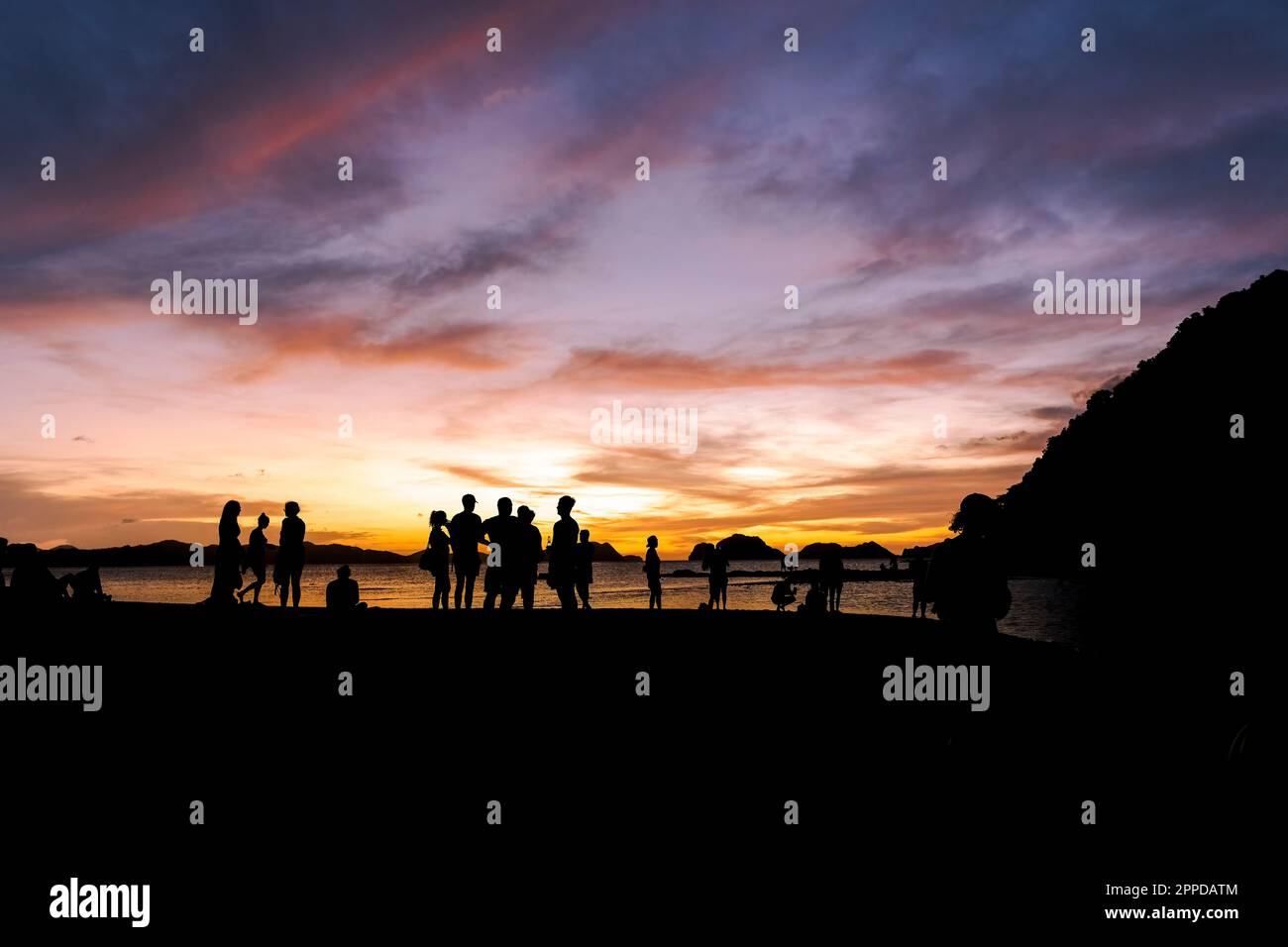 Silhouette of unrecognizable people at beach Stock Photo - Alamy