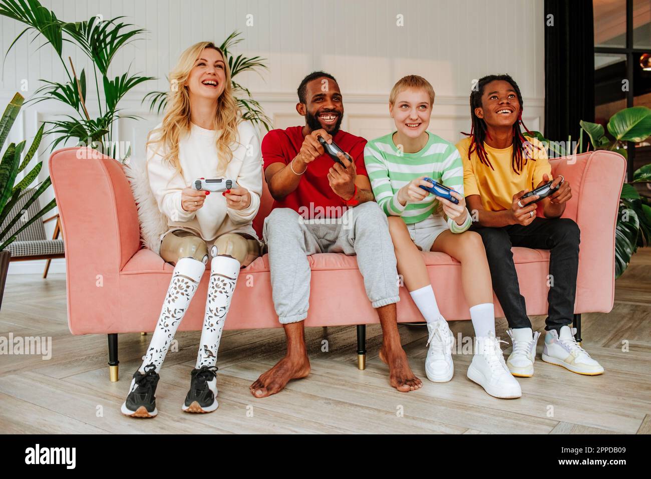 Multi ethnic people enjoying game hi-res stock photography and images ...