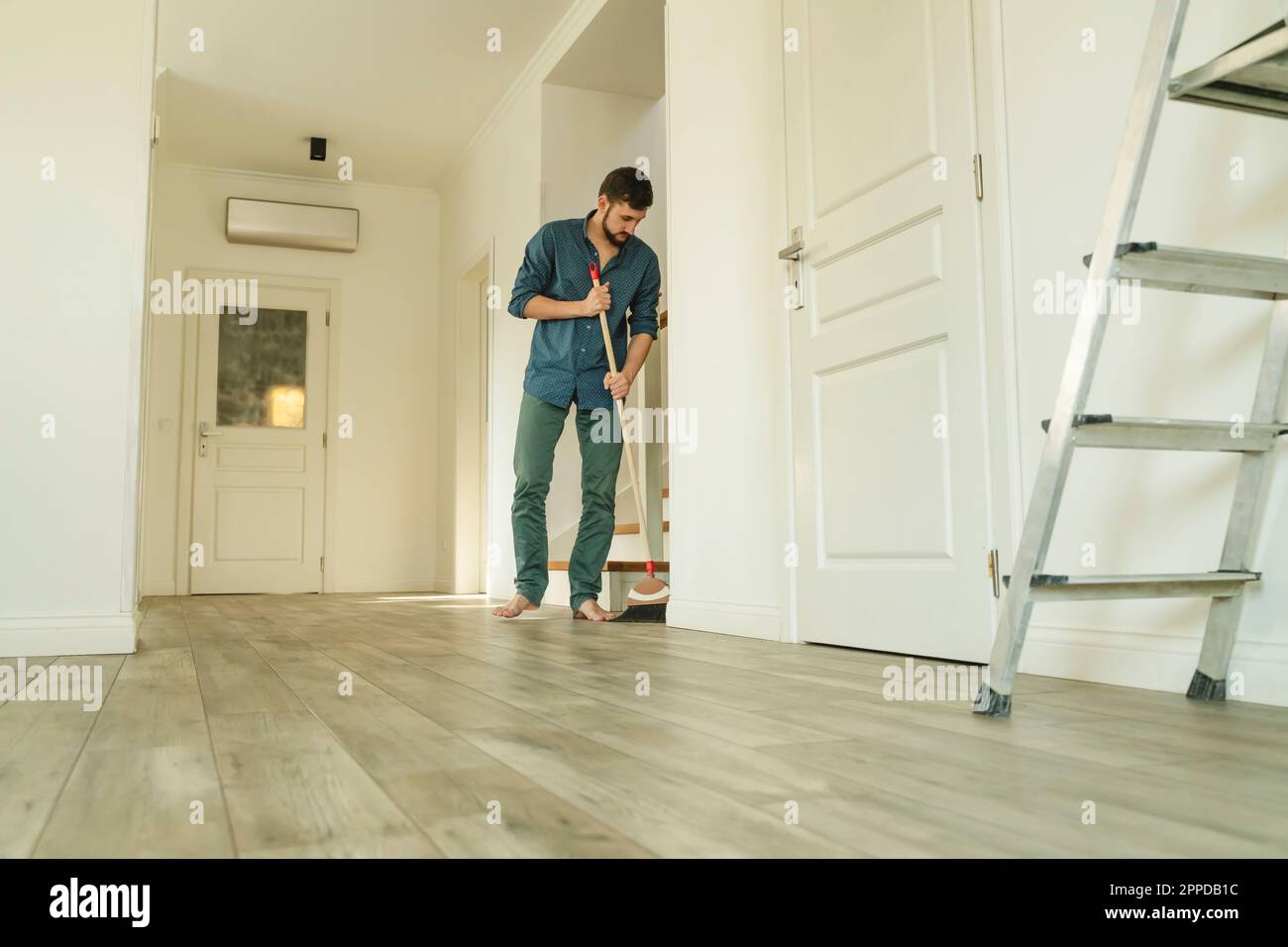 Man doing housework hi-res stock photography and images - Alamy