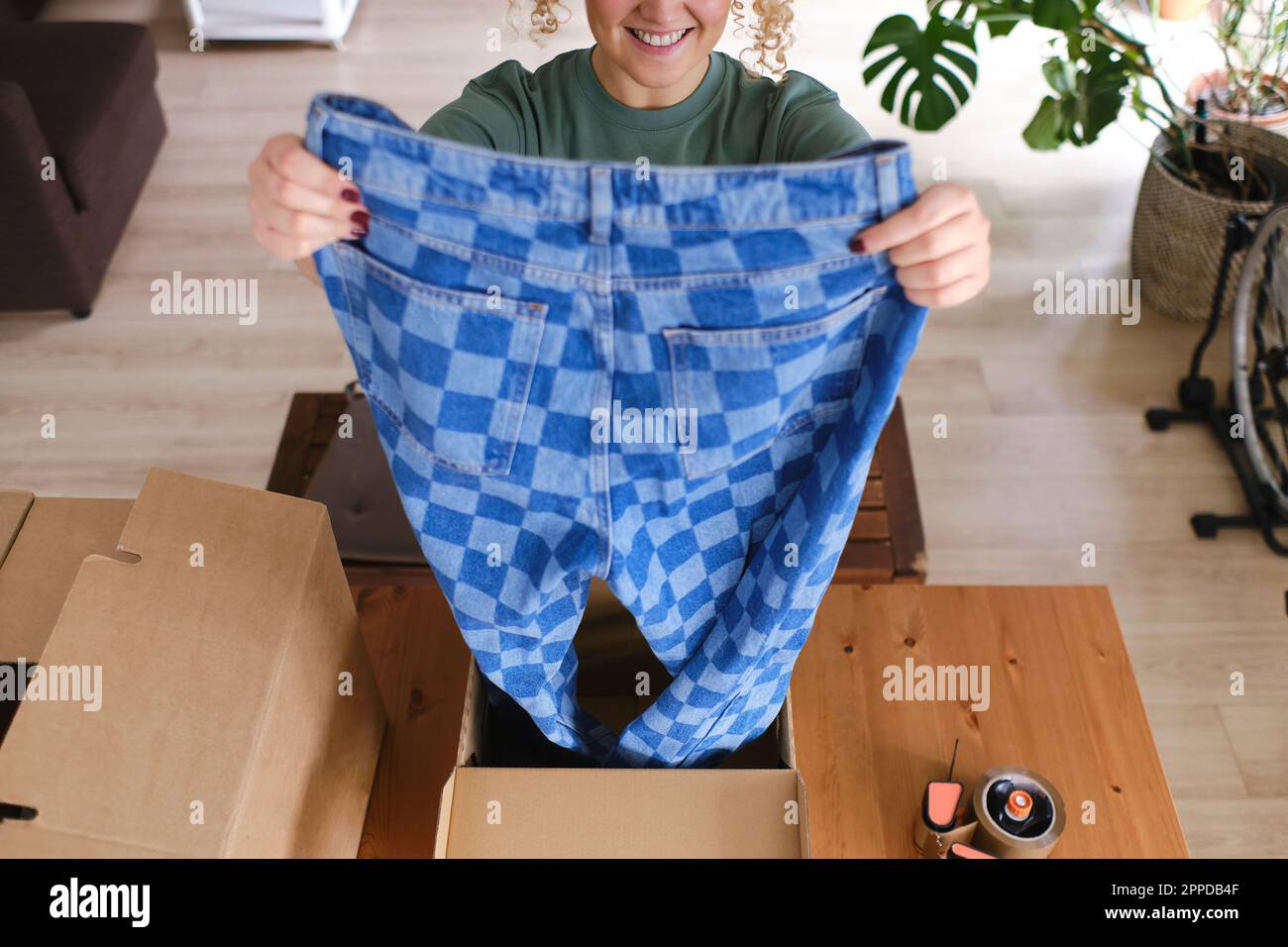 Checked jeans hi-res stock photography and images - Alamy