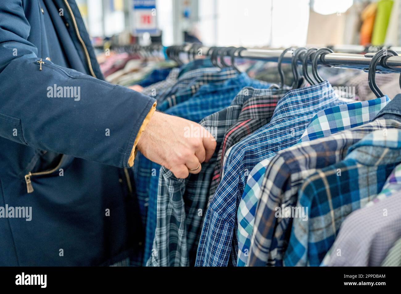 Hand clothes hanger hi-res stock photography and images - Alamy