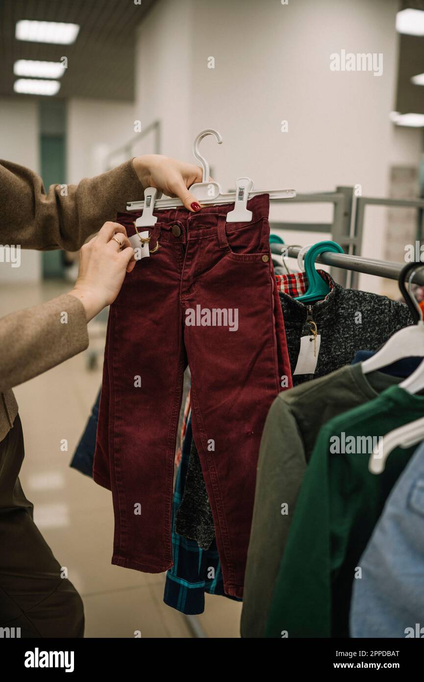 Pants rack hi-res stock photography and images - Alamy