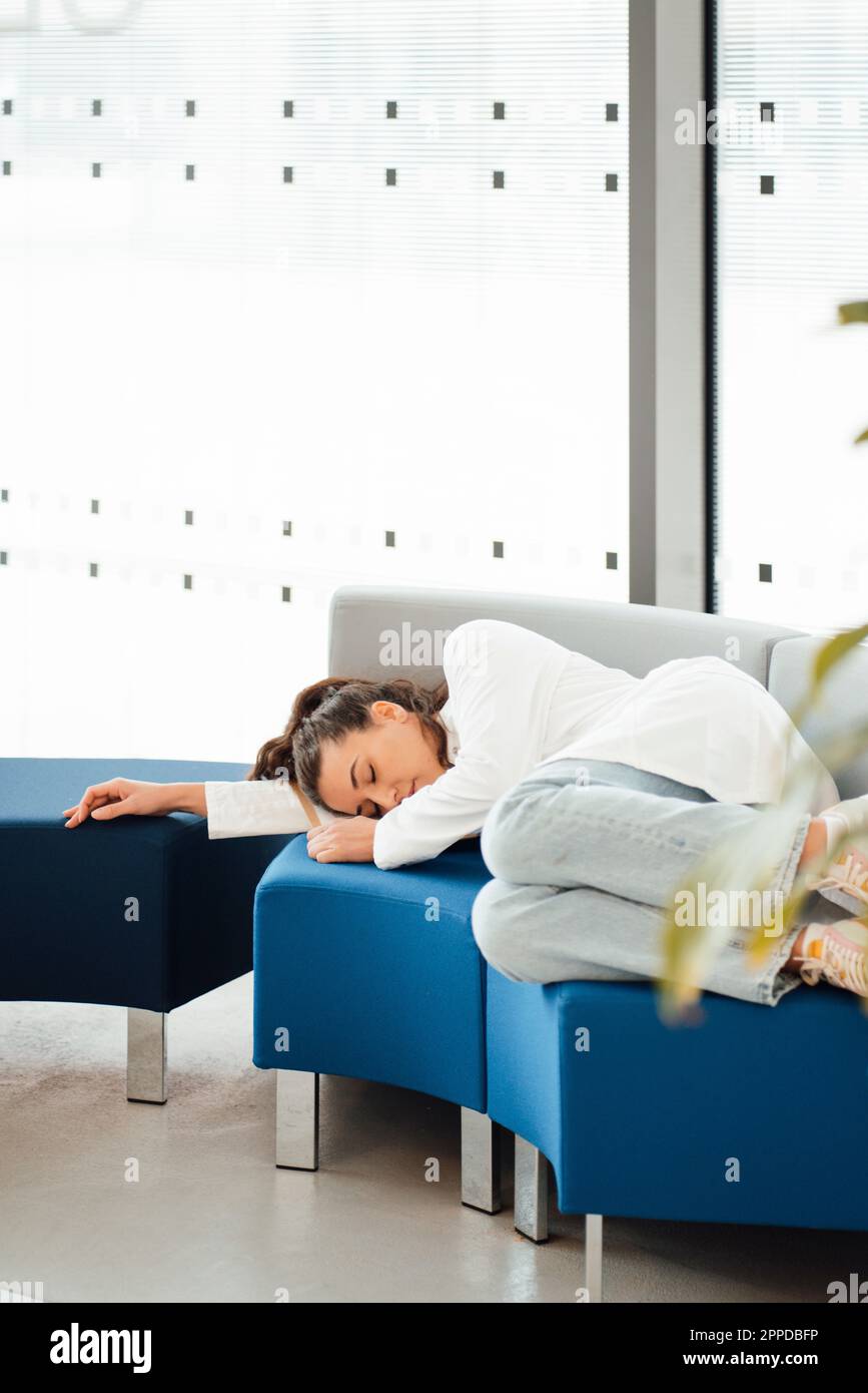 Tired lying woman hi-res stock photography and images - Alamy