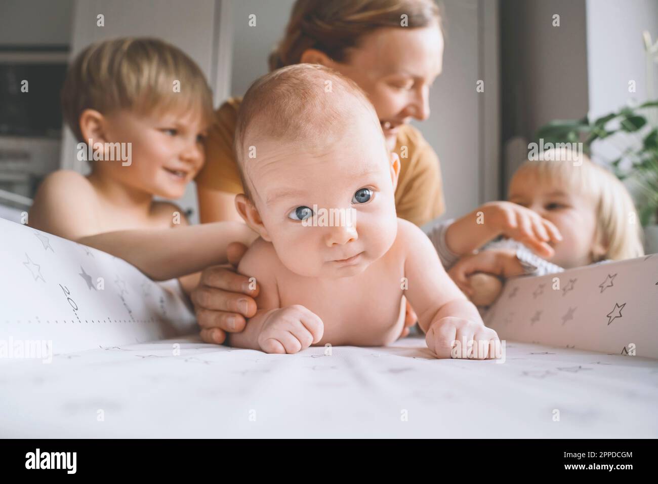 Children taking care of children hi-res stock photography and images ...