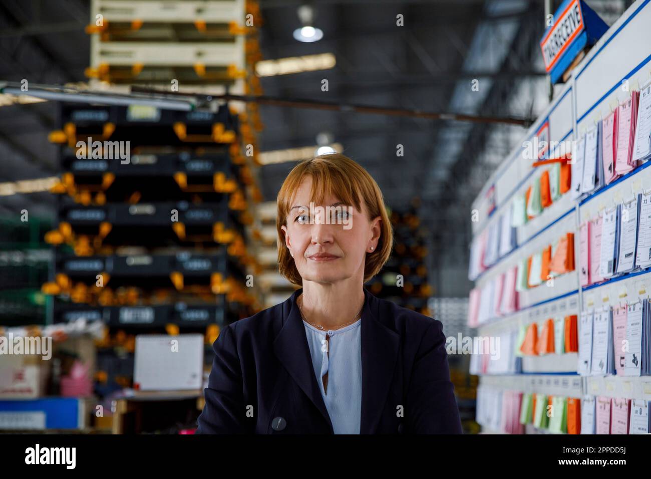 Mature manager looking camera hi-res stock photography and images - Alamy