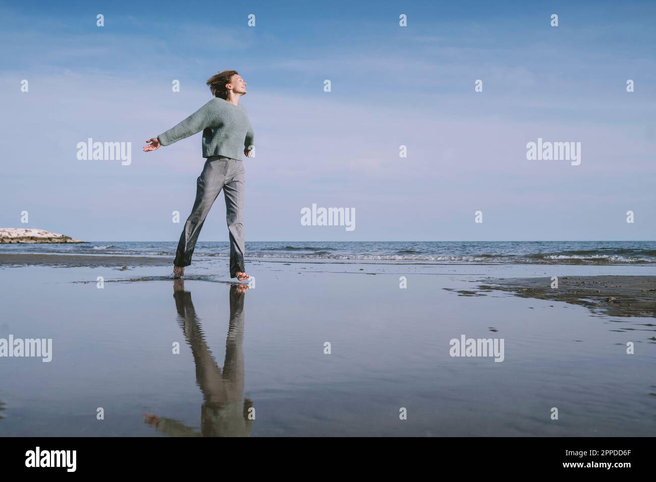 Reflection woman beach hi-res stock photography and images - Alamy