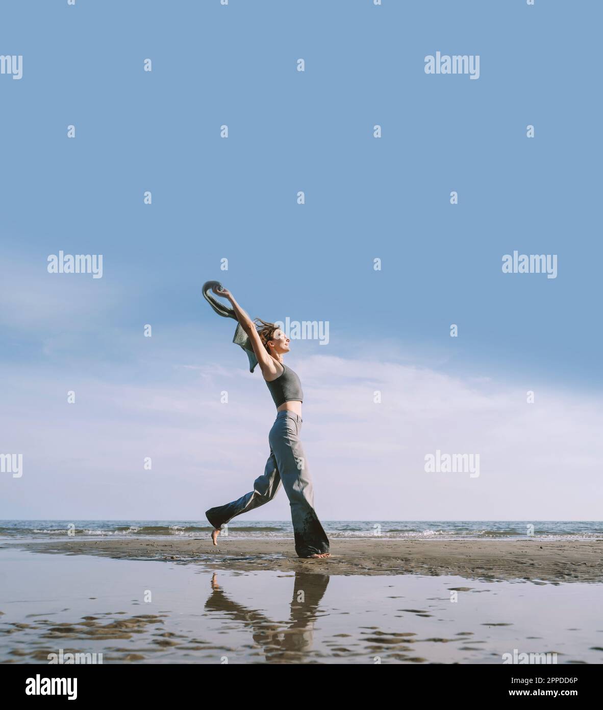 Reflection woman beach hi-res stock photography and images - Alamy