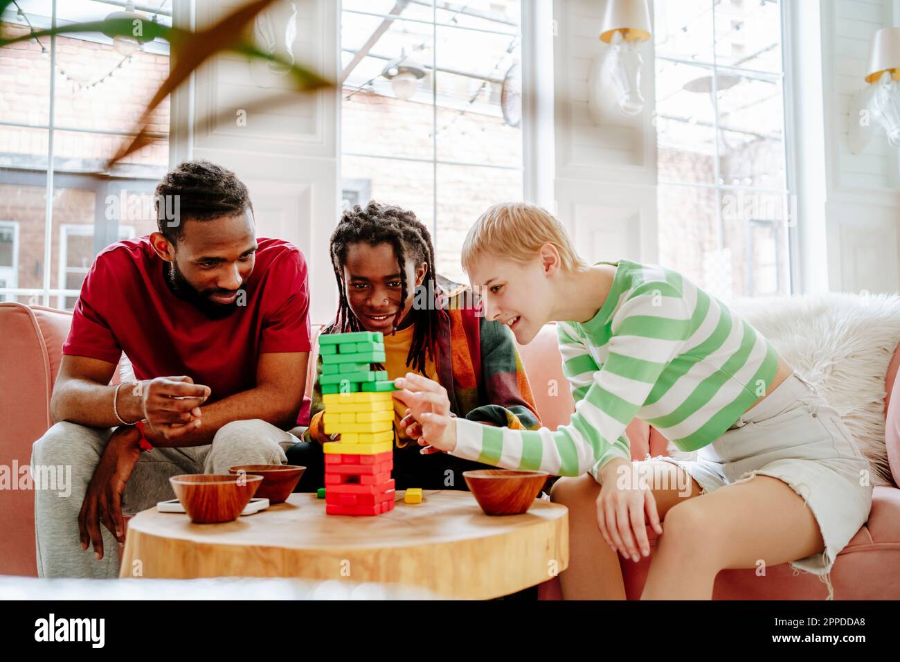 Diversity playing friends hi-res stock photography and images - Alamy
