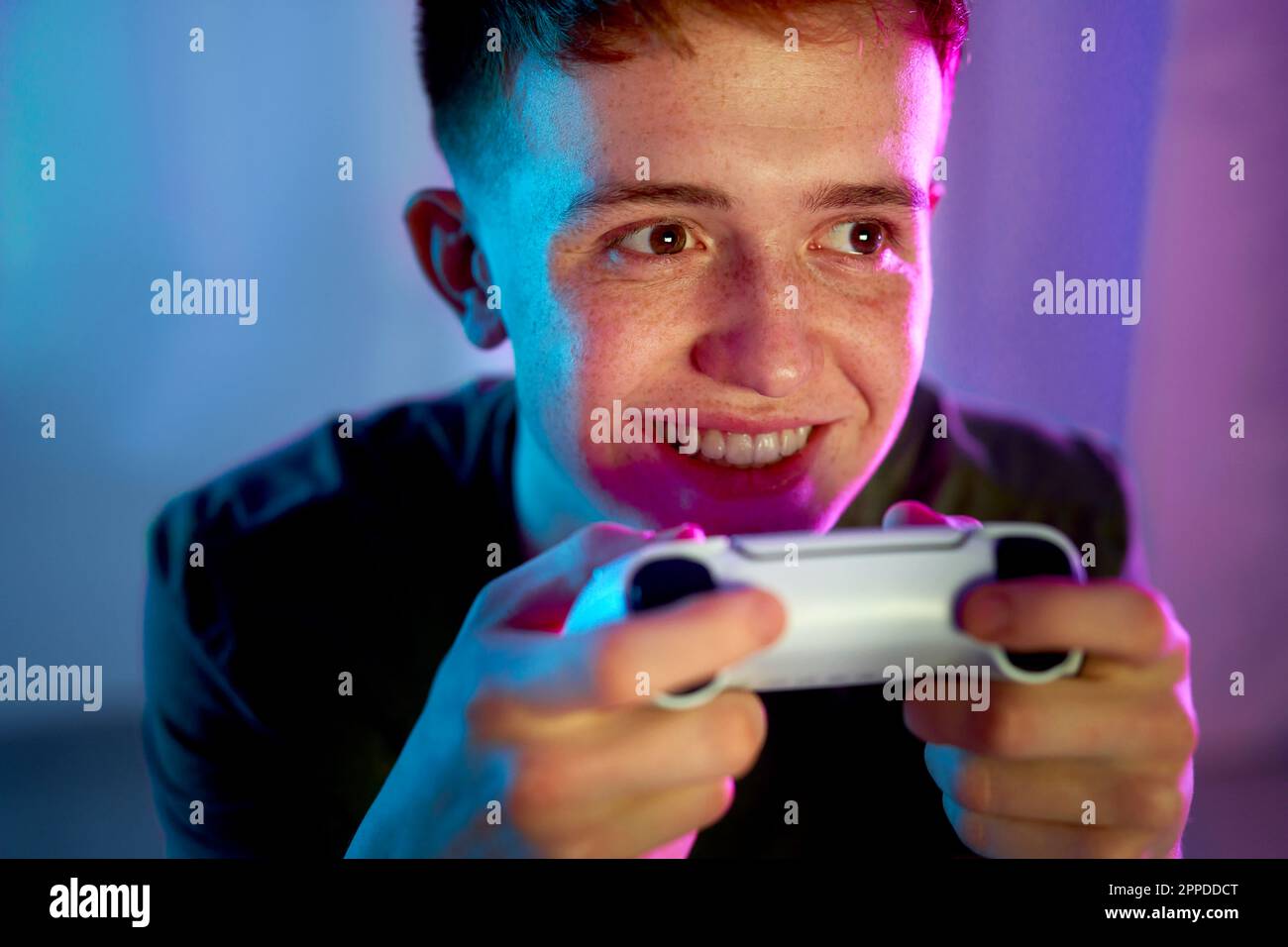 Male hands young gamer playing hi-res stock photography and images - Alamy