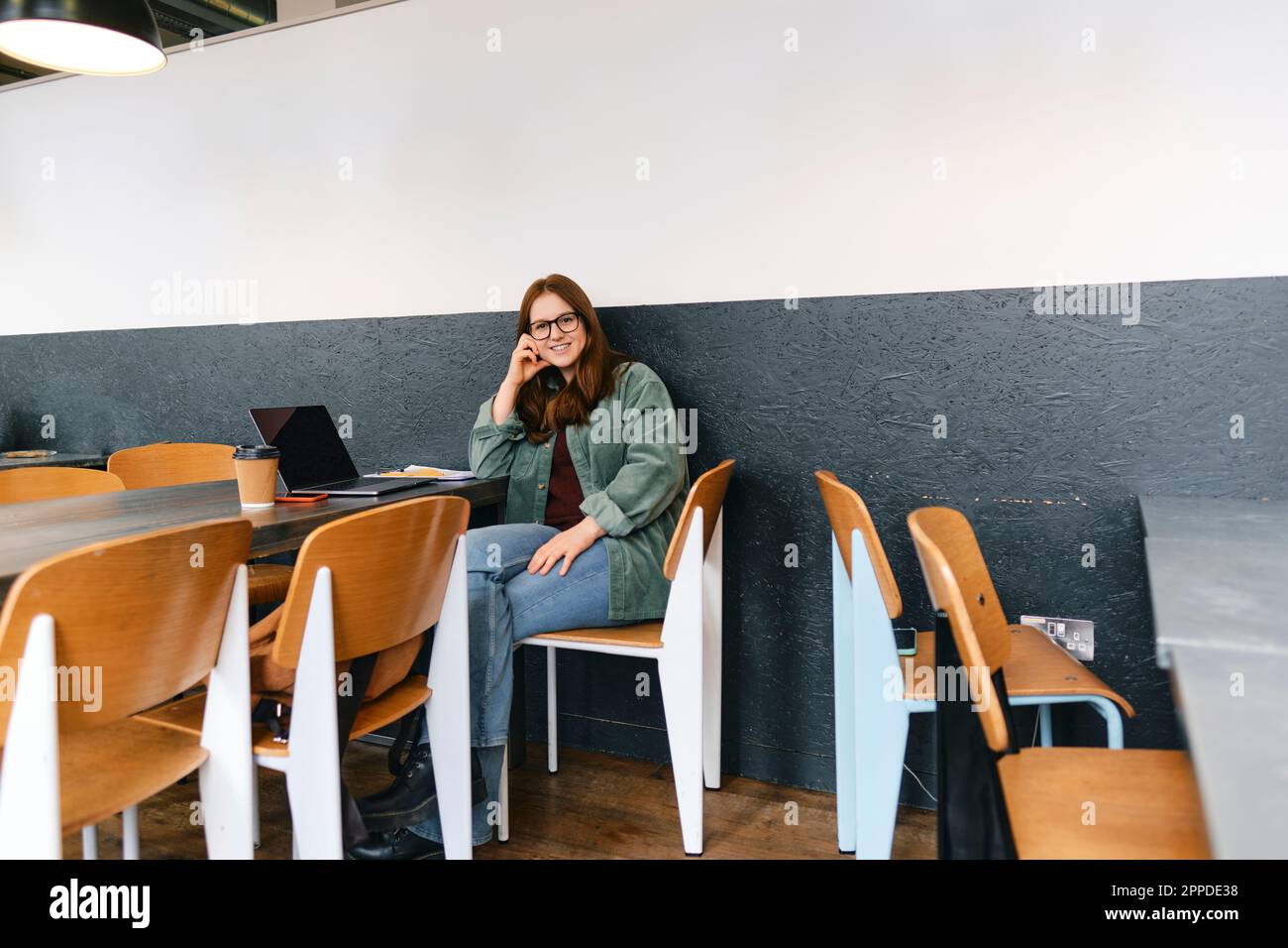 Freelancer sitting on chair hi-res stock photography and images - Alamy