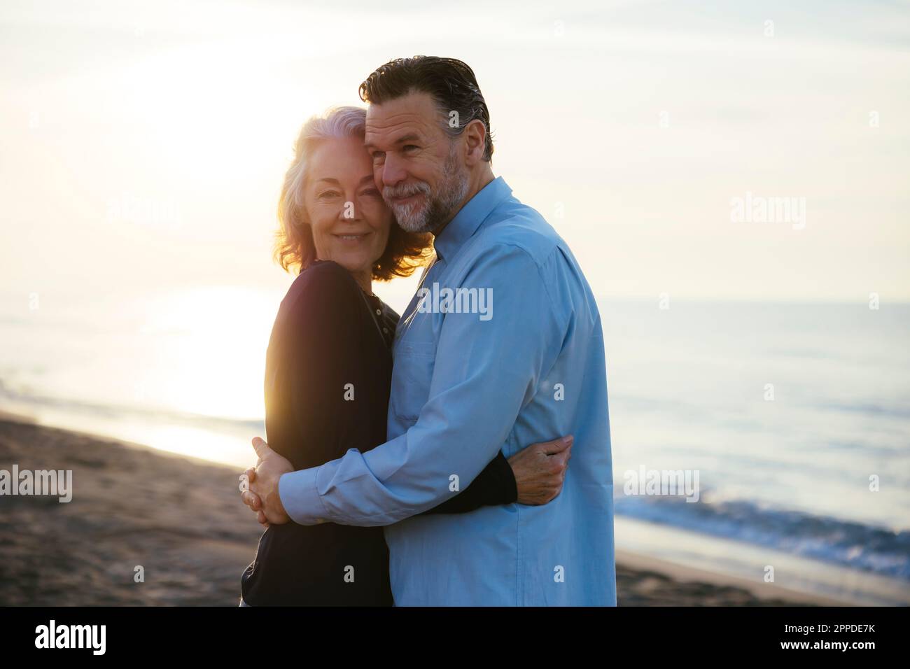 Portrait mature woman hugging man hi-res stock photography and images ...