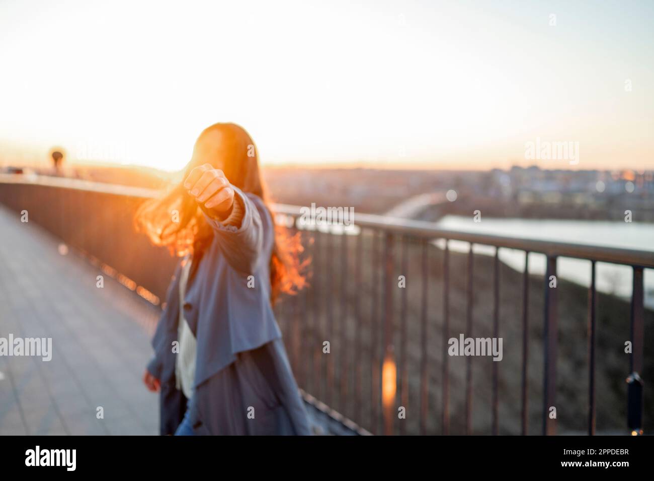 Hand reaching for railing hi-res stock photography and images - Alamy
