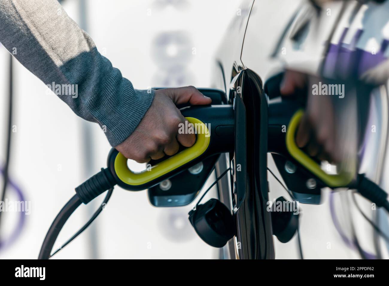 Man hand plugging hi-res stock photography and images - Alamy