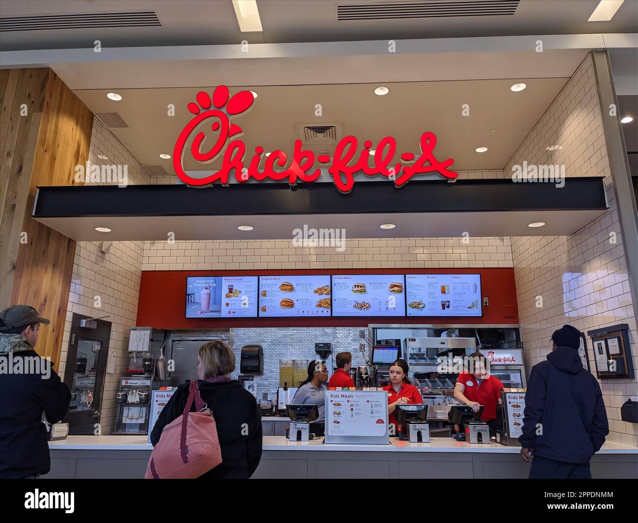 Chick-fil-A restaurant people waiting in line at food menu ordering ...