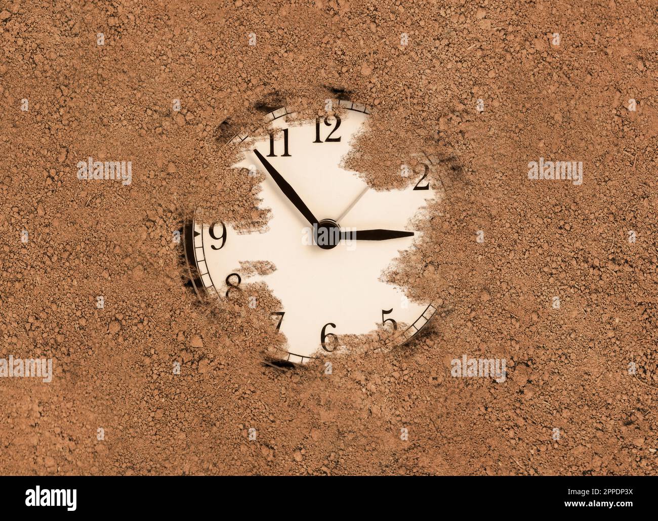 Black clock buried and lost in the sand. lost time concept Stock Photo ...