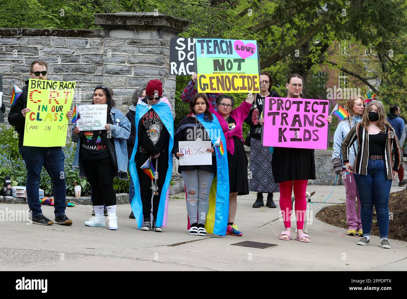 State College, United States. 23rd Apr, 2023. Protesters hold signs at ...