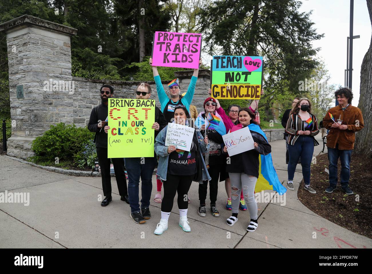 State College, United States. 23rd Apr, 2023. Protesters hold signs at ...