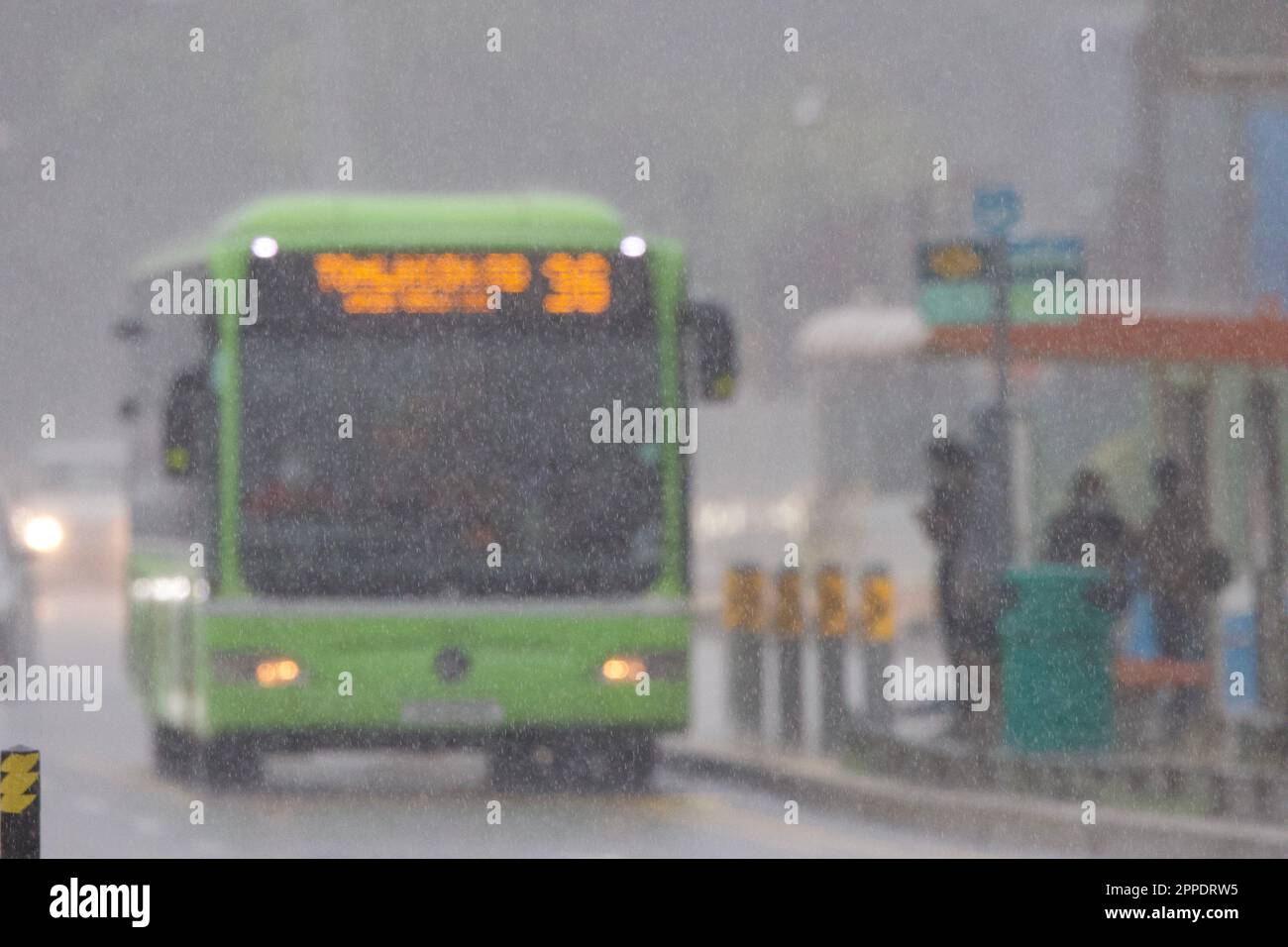Bus in the rain, Singapore Stock Photo - Alamy