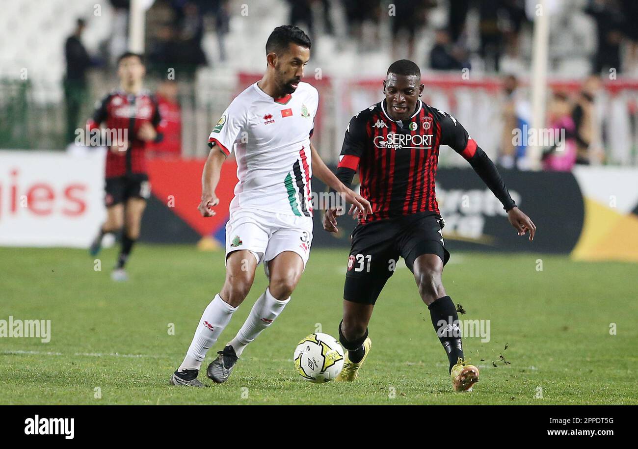 Algiers. 24th Apr, 2023. USM Alger's Tumisang Orebonye (R) vies with ...