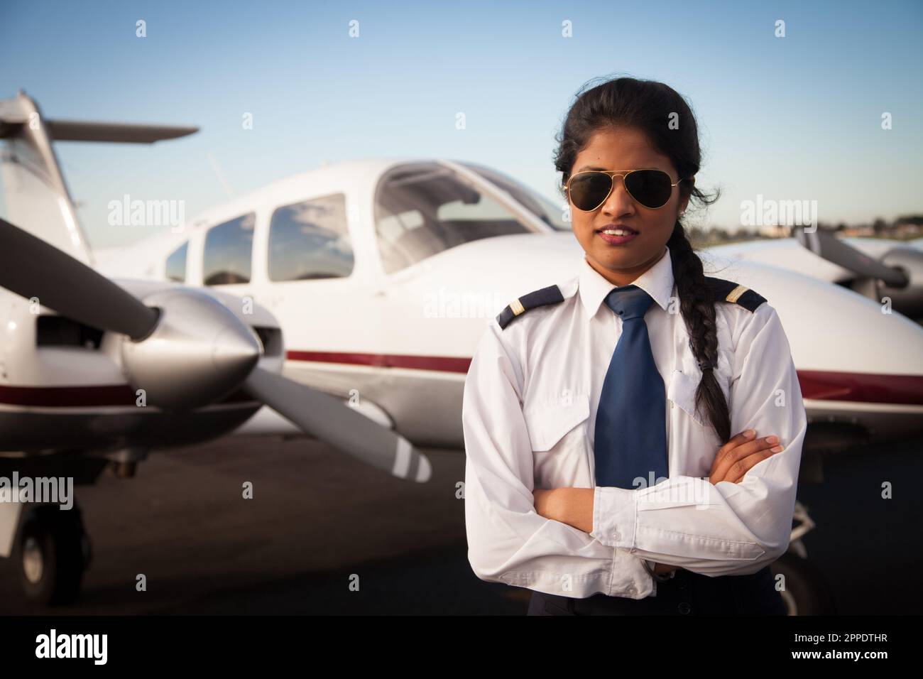 Female Pilot Standing in Front of Her Aircraft Stock Photo - Alamy