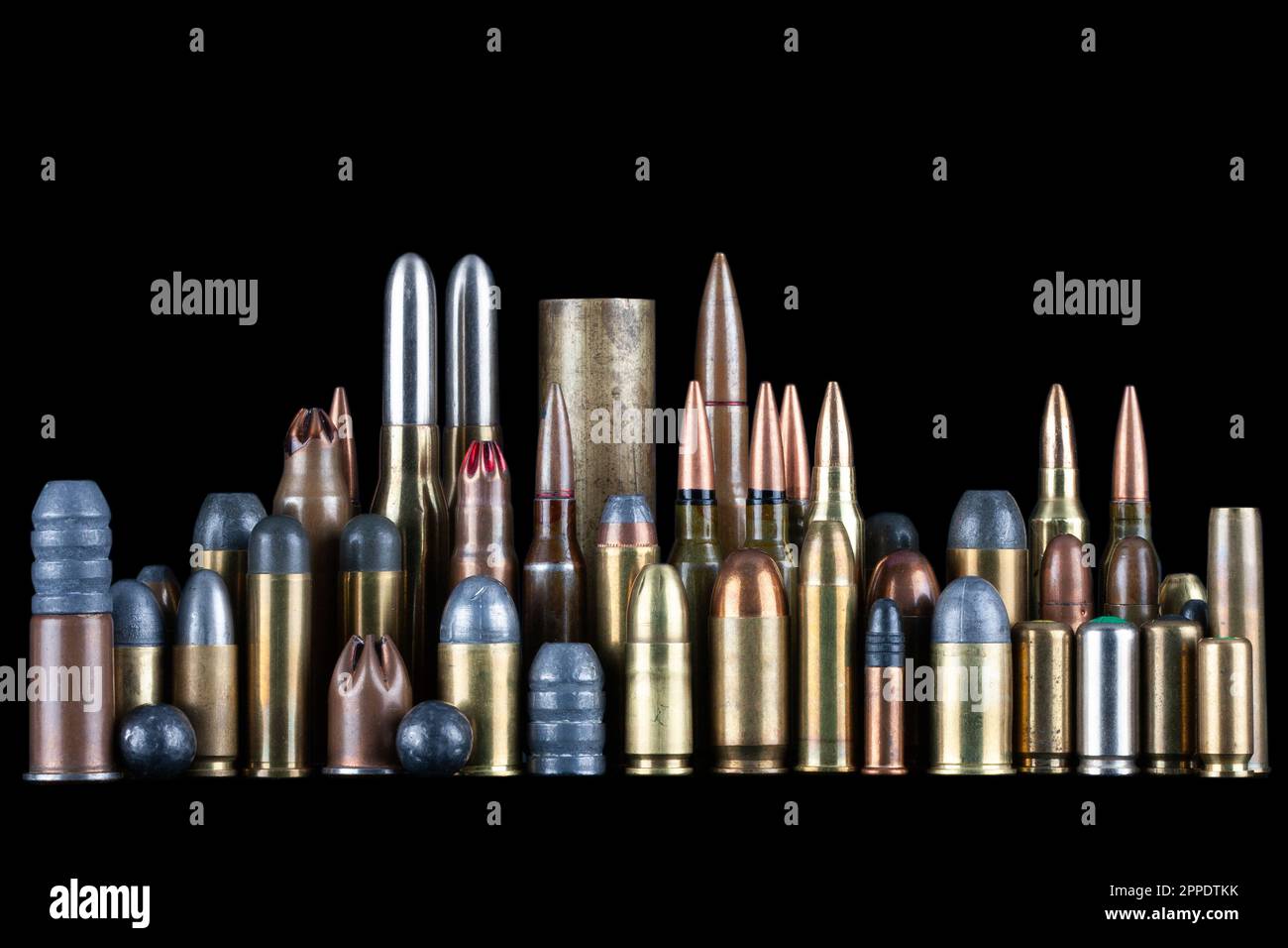 Ammuninition on black background. Different cartridges for rifle ...