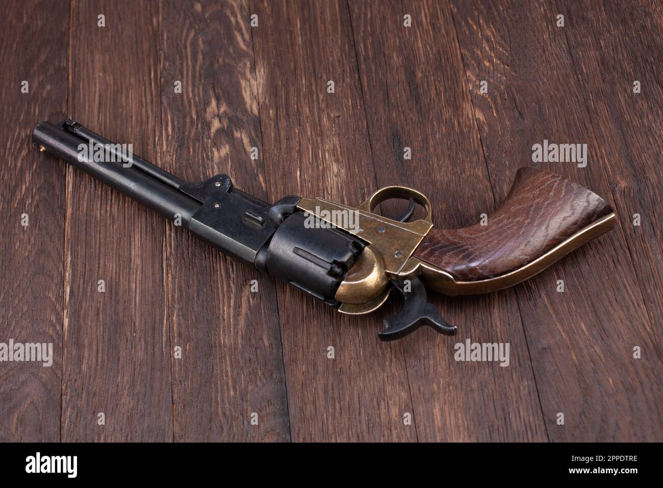 Old West gun - Percussion Army Revolver on wooden table Stock Photo - Alamy
