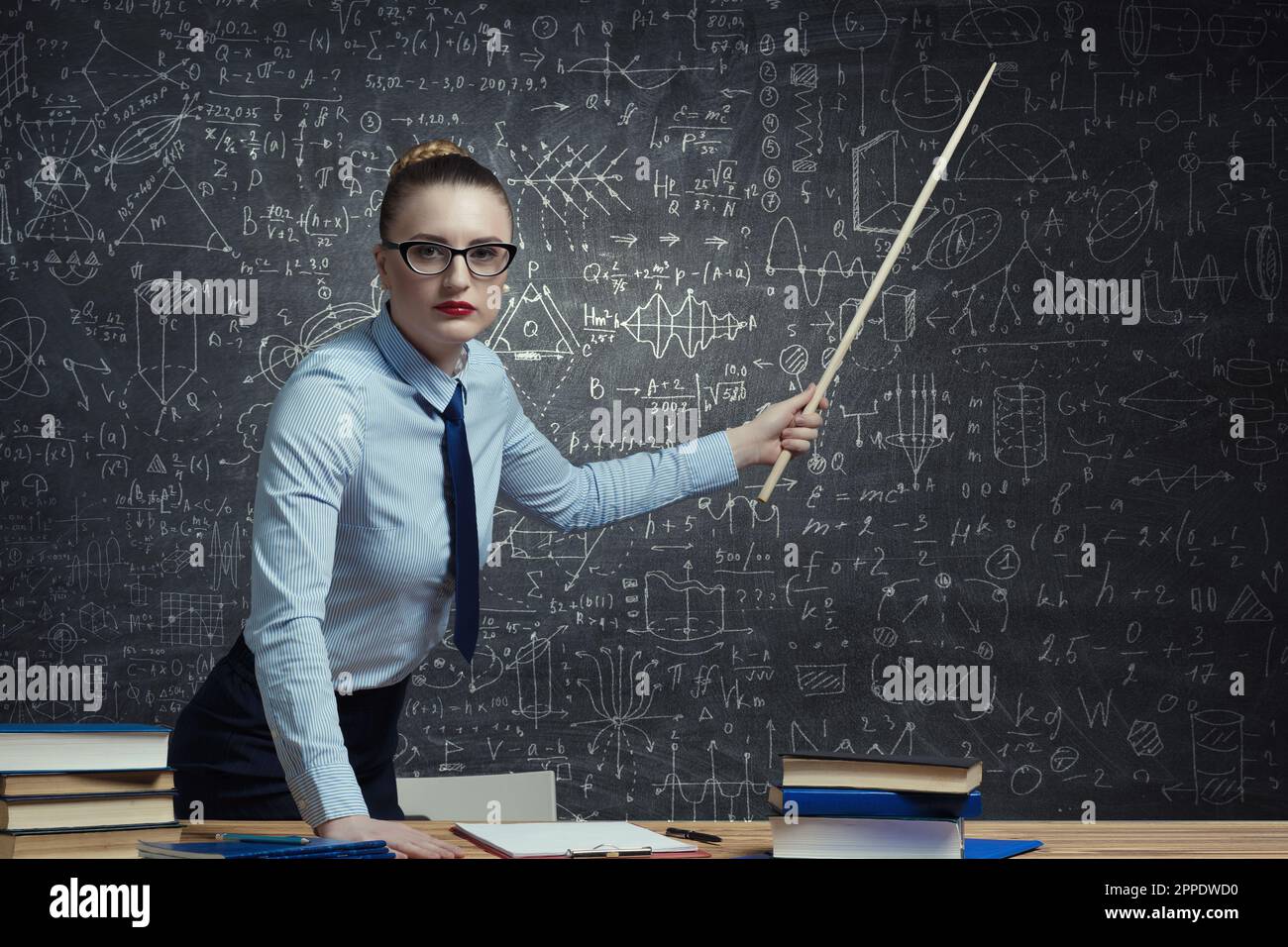 Strict female teacher . Mixed media Stock Photo - Alamy